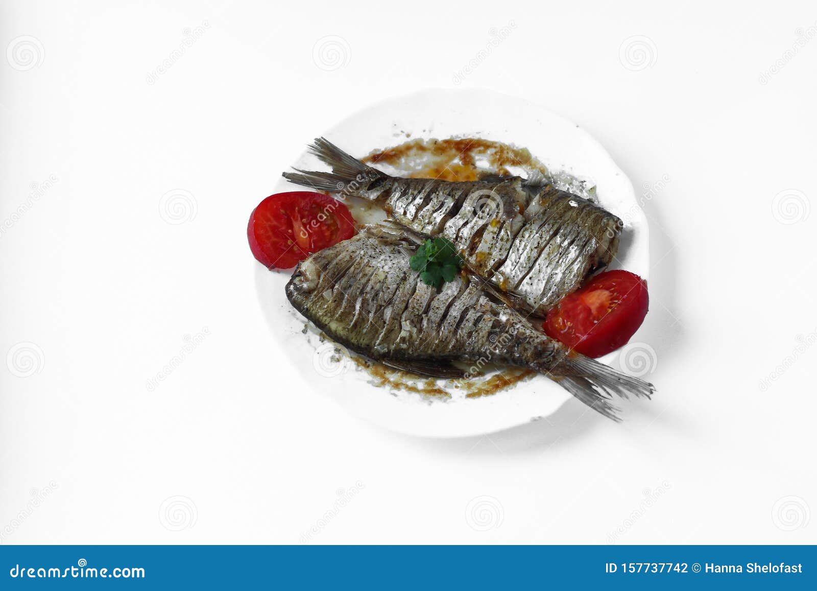 Two Raw Fish on a White Plate Stock Photo - Image of baked, seafood ...