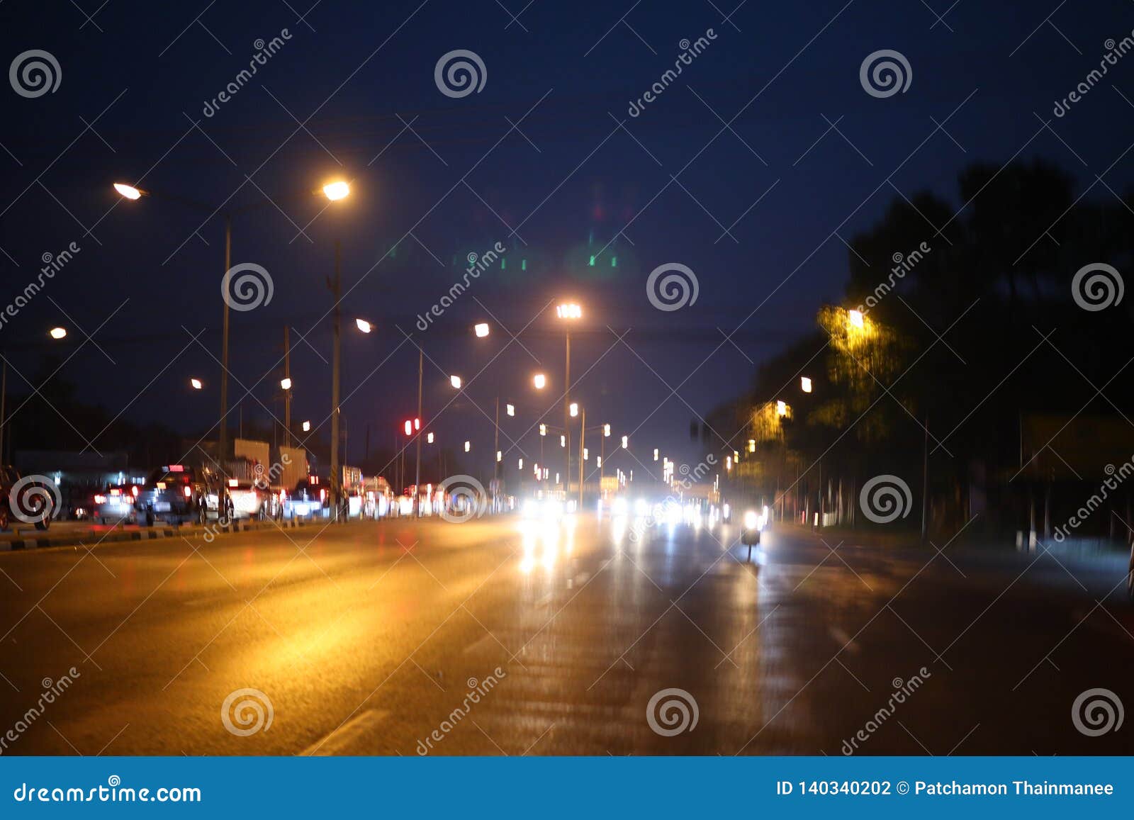 The Main Road at Night, There is a Car Running Back and There is a ...