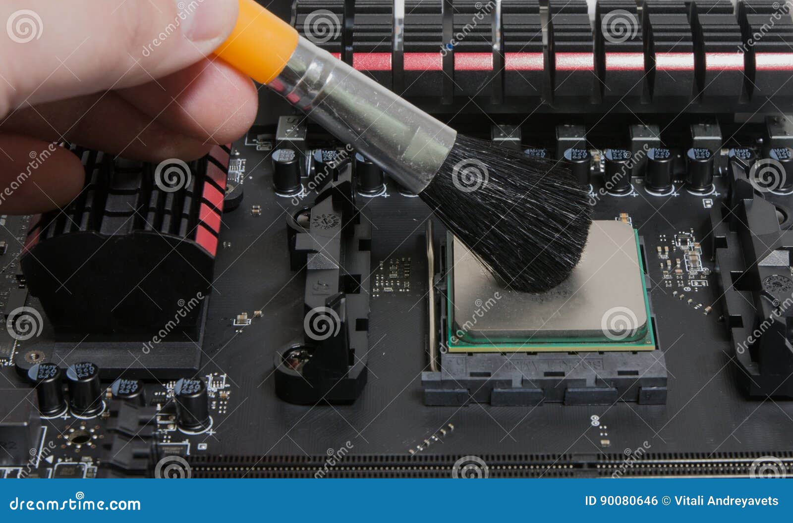 Maintaining The Motherboard With A Dust Brush Stock Photo ...