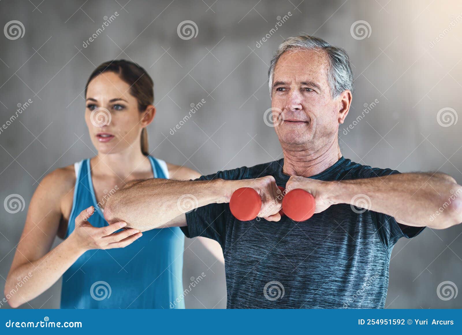 Maintaining Muscle Mass with Regular Exercise. a Senior Man Using ...