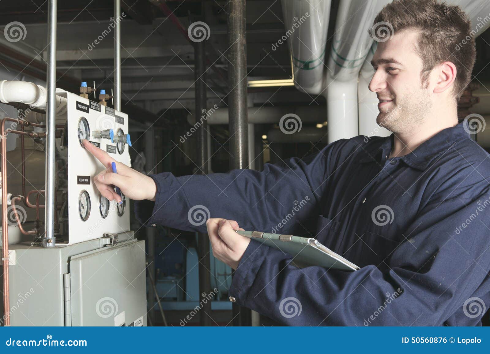 Maintenance Engineer Checking Technical Data of Stock Photo - Image of ...