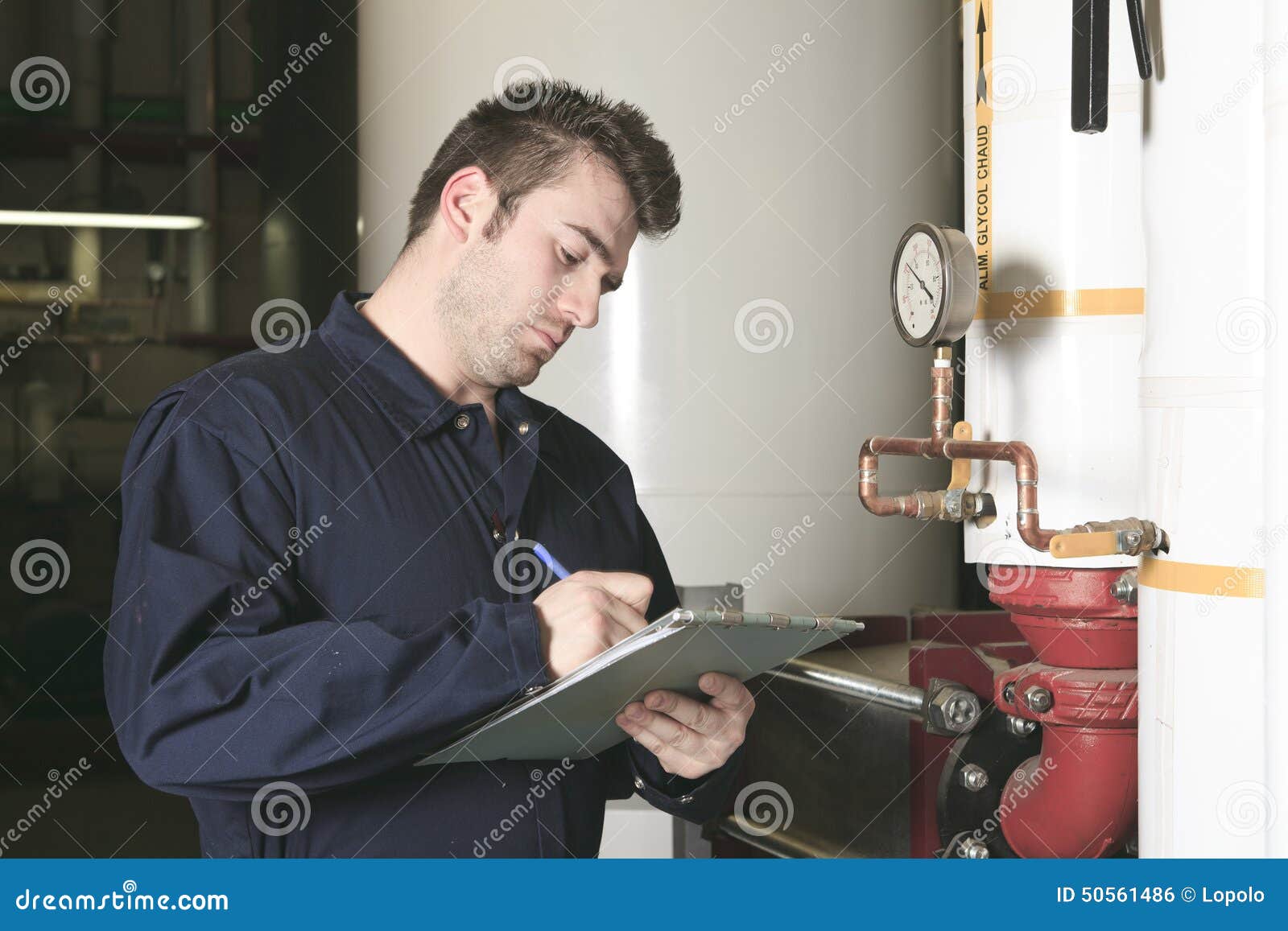 Maintenance Engineer Checking Technical Data of Stock Photo - Image of ...