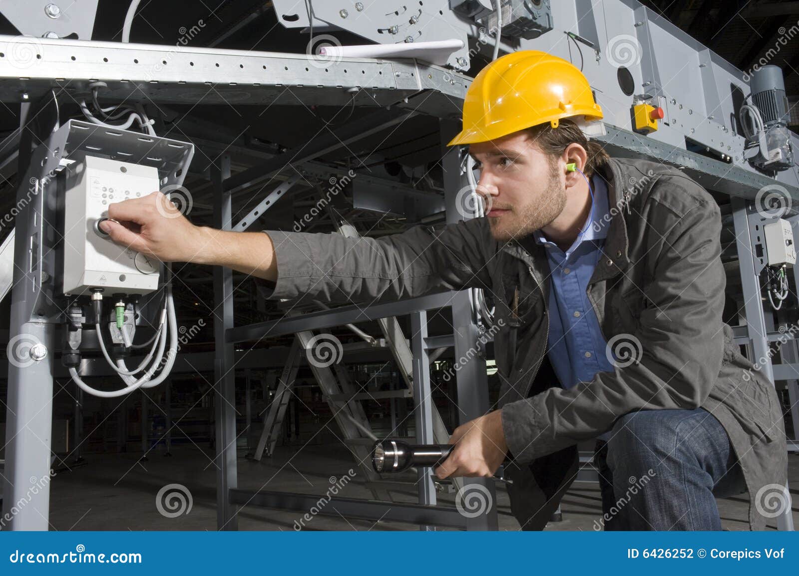 Maintenance Engineer at Work Stock Photo - Image of turning, coat: 6426252