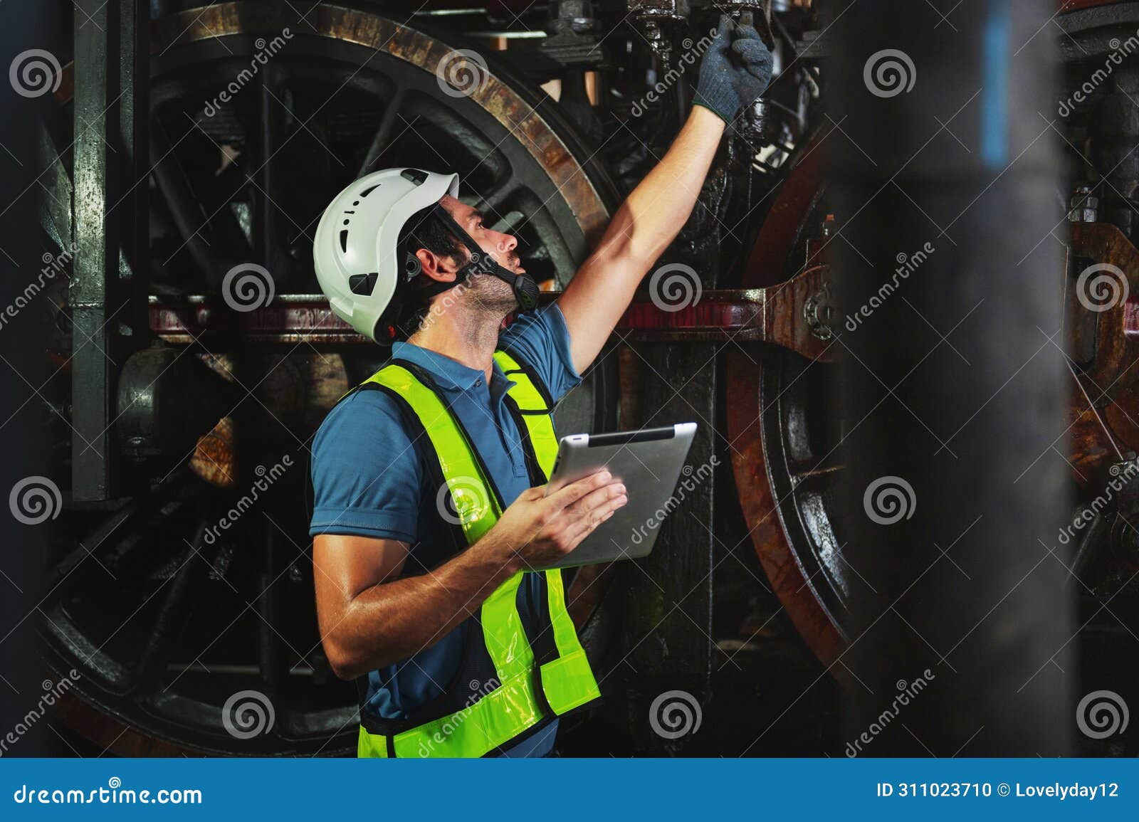 Maintenance Engineer Working Operating Machines in Industry Factory ...