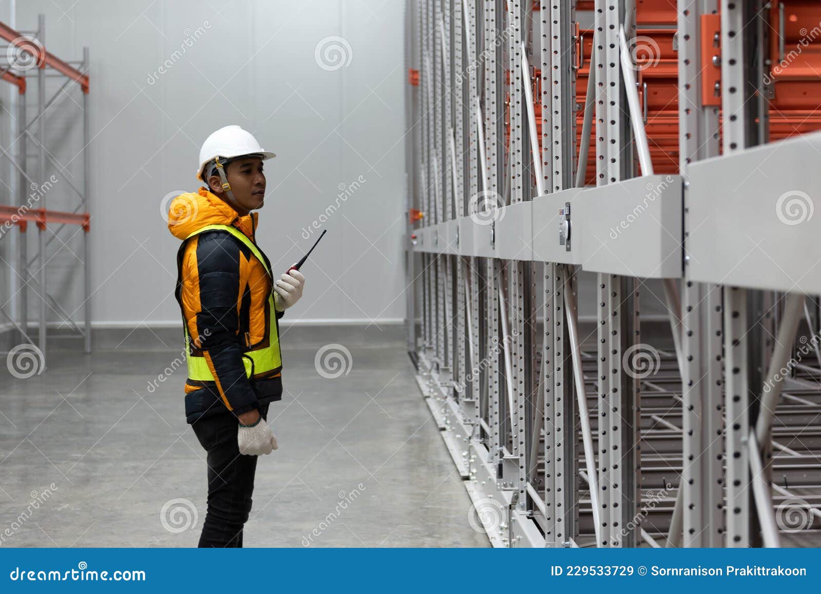 Maintenance Engineering Checking Moving Rack System in Warehouse ...