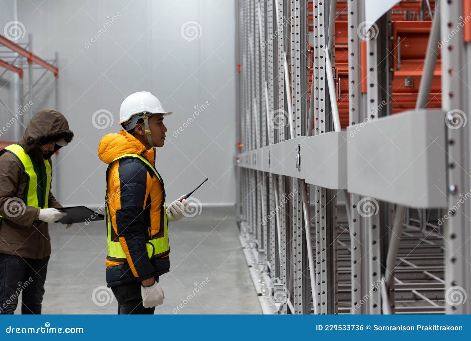 Maintenance Engineering Checking Moving Rack System in Warehouse ...