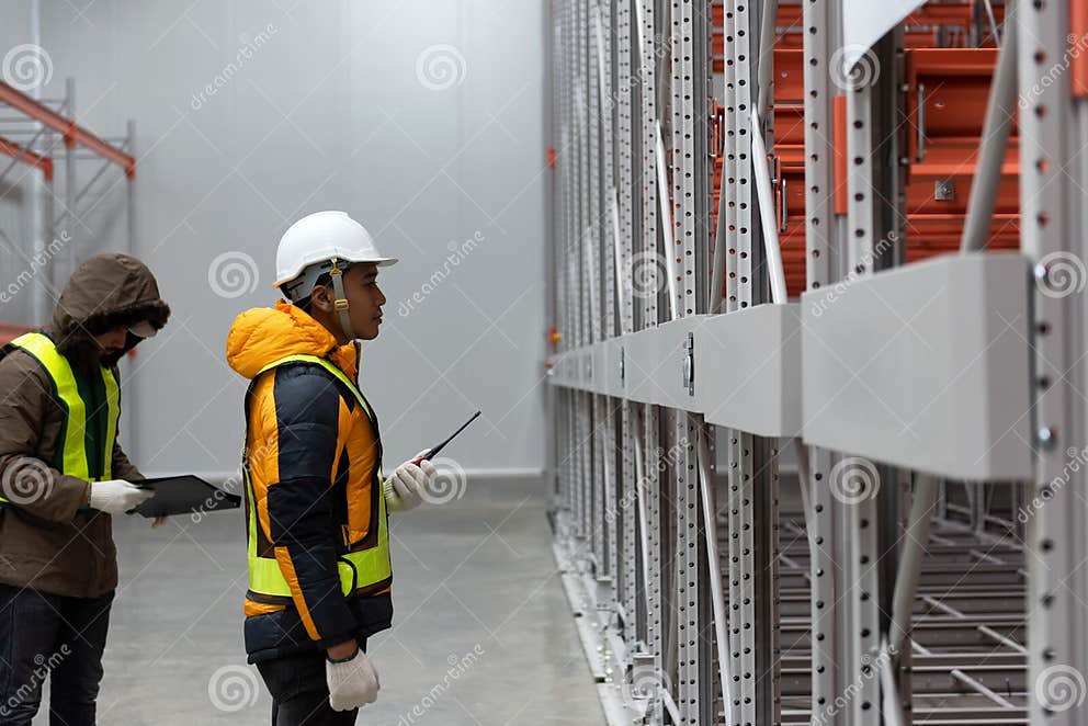 Maintenance Engineering Checking Moving Rack System in Warehouse ...