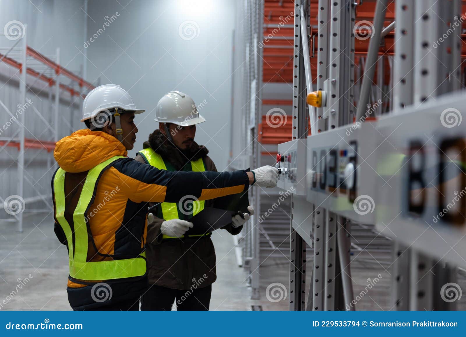 Maintenance Engineering Checking Moving Rack System in Warehouse ...