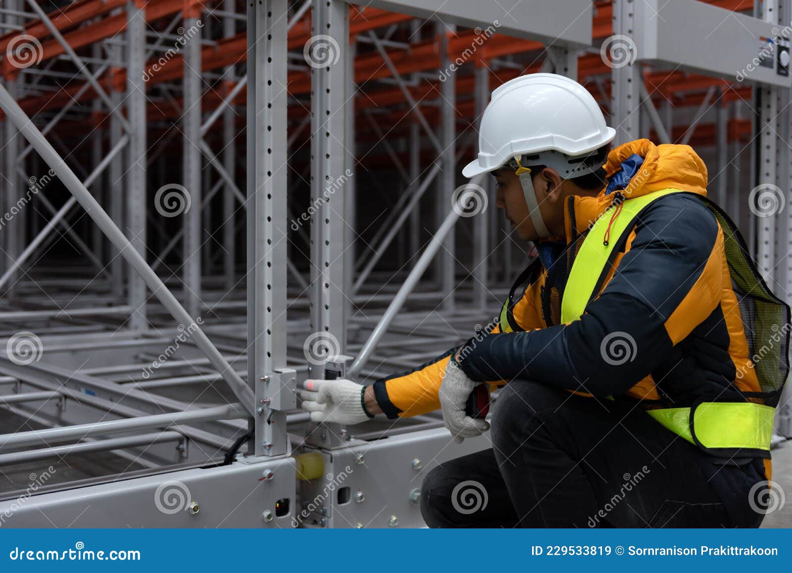 Maintenance Engineering Checking Moving Rack System in Warehouse ...