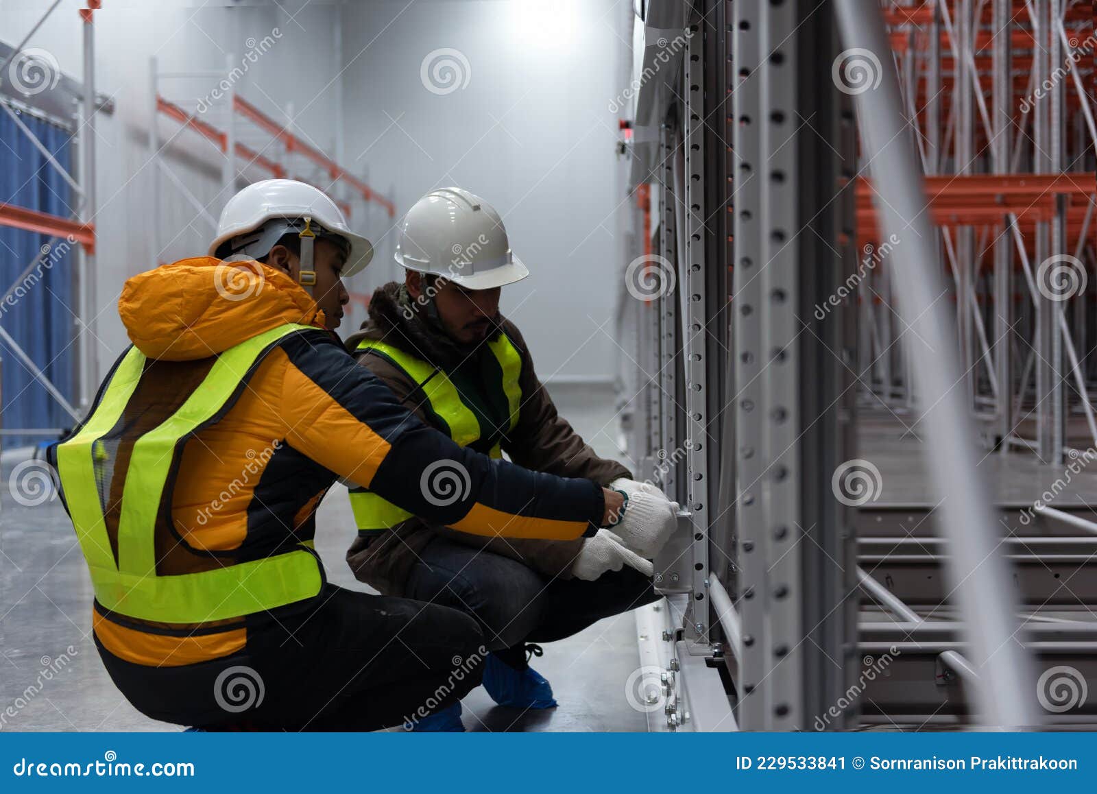 Maintenance Engineering Checking Moving Rack System in Warehouse ...