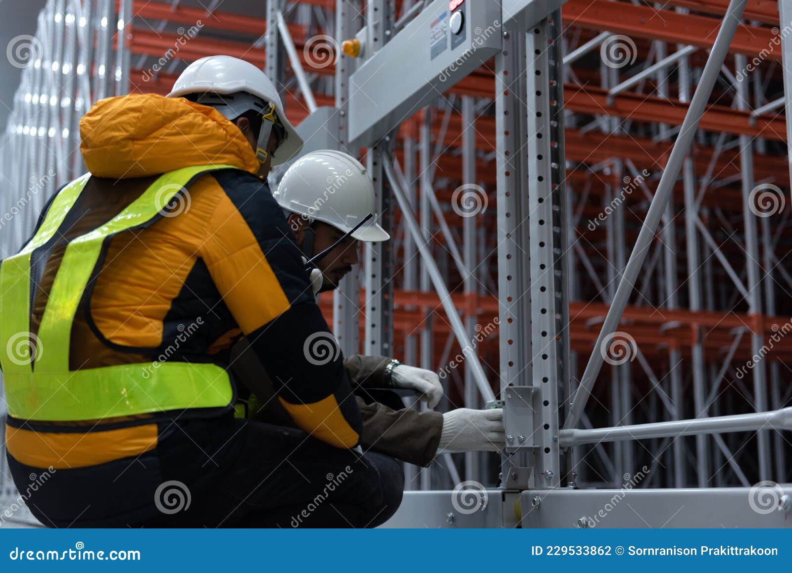 Maintenance Engineering Checking Moving Rack System in Warehouse ...