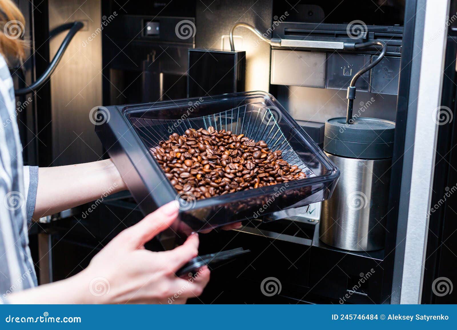 Maintenance of Modern Coffee Machines. Loading Coffee Beans. Stock ...