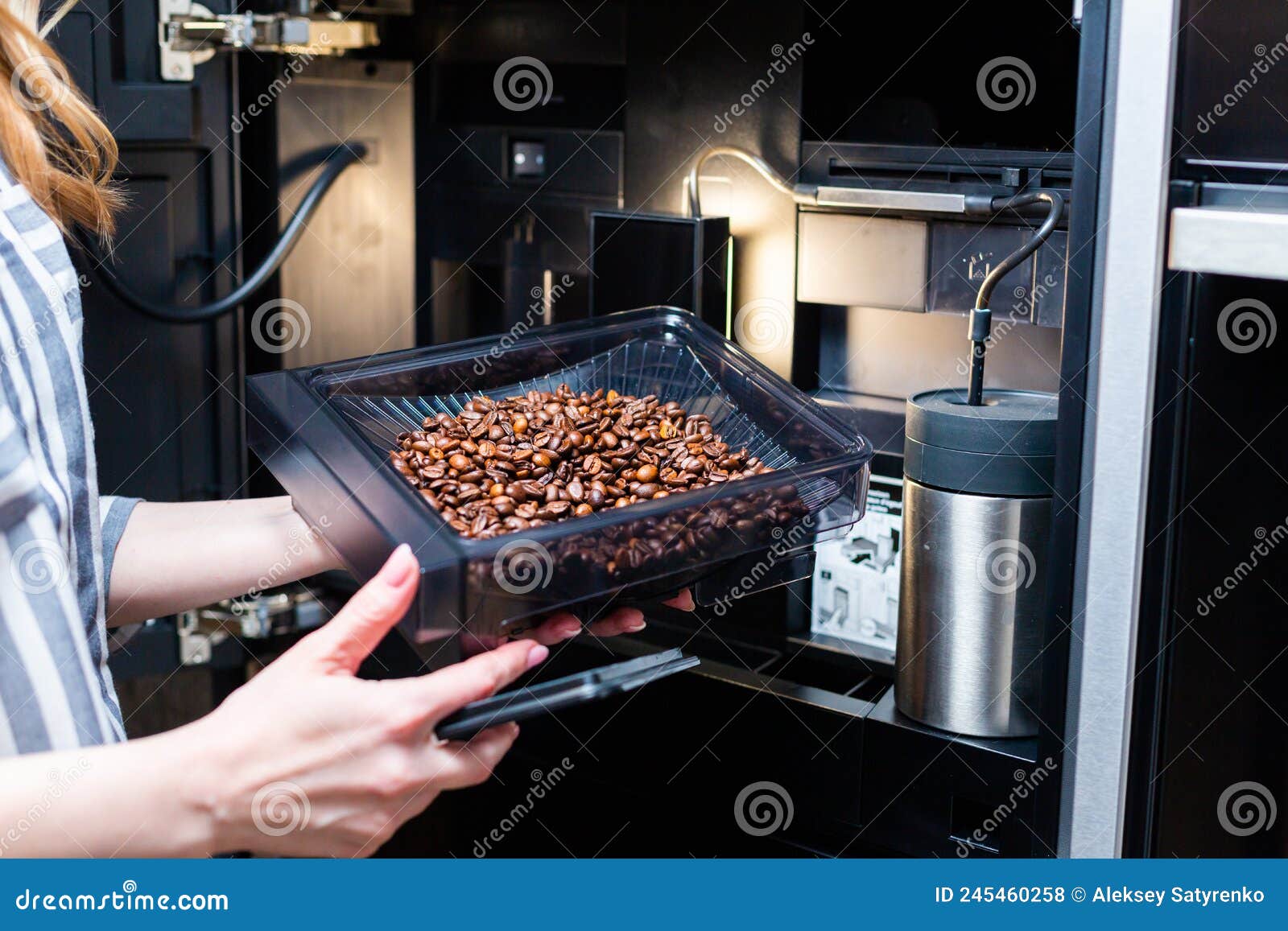 Maintenance of Modern Coffee Machines. Loading Coffee Beans. Stock ...