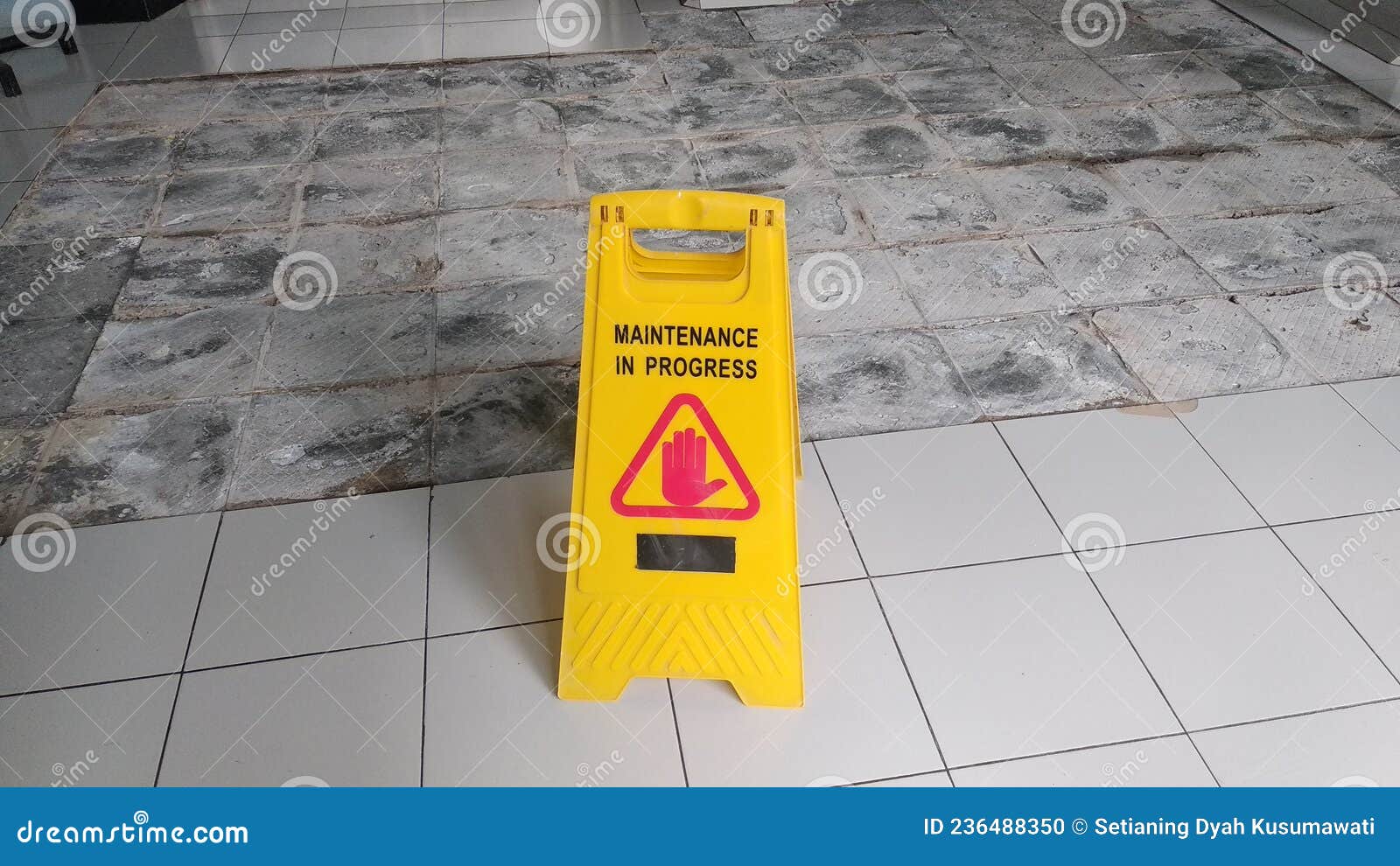 "Maintenance in Progress" Sign in the Floor Stock Photo - Image of slip ...