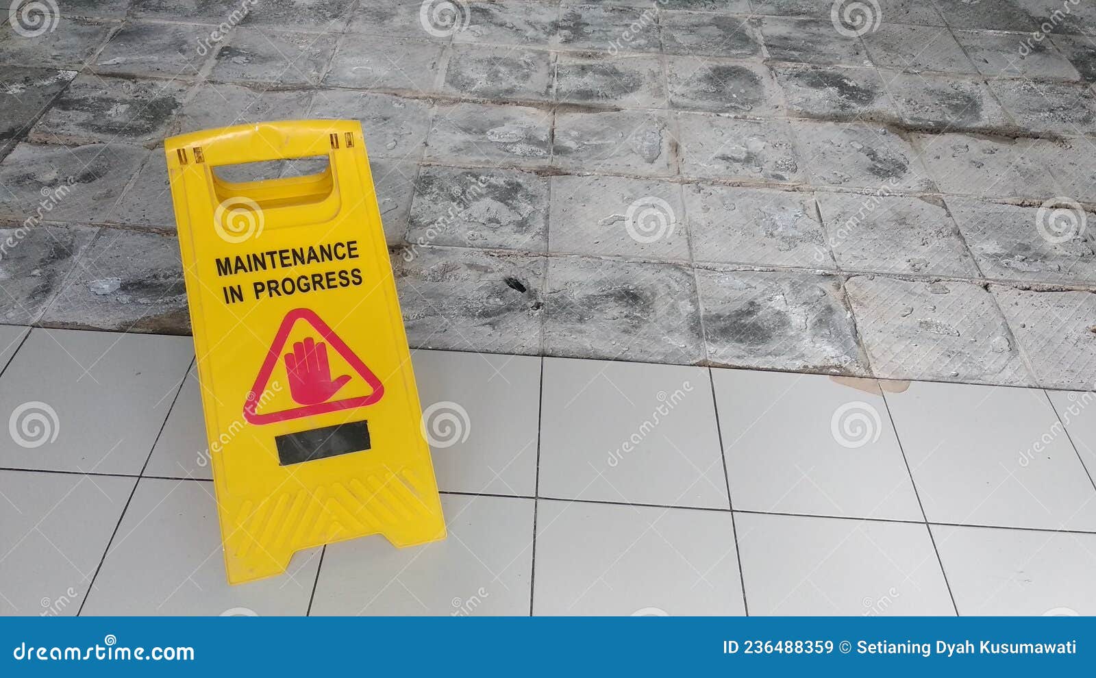 "Maintenance in Progress" Sign in the Floor Stock Image - Image of ...