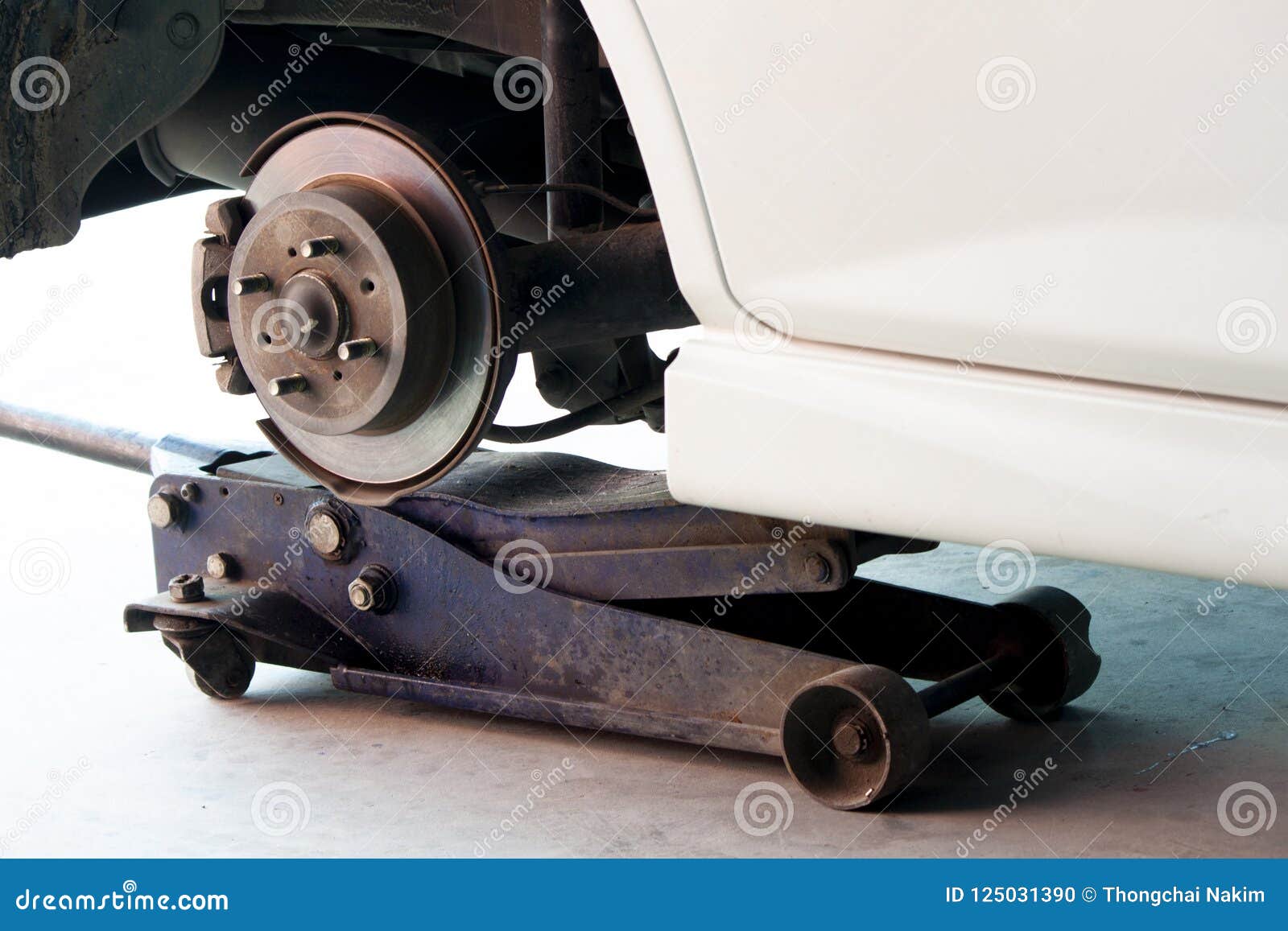 Maintenance by Remove Wheel from Car. Stock Photo - Image of jack ...