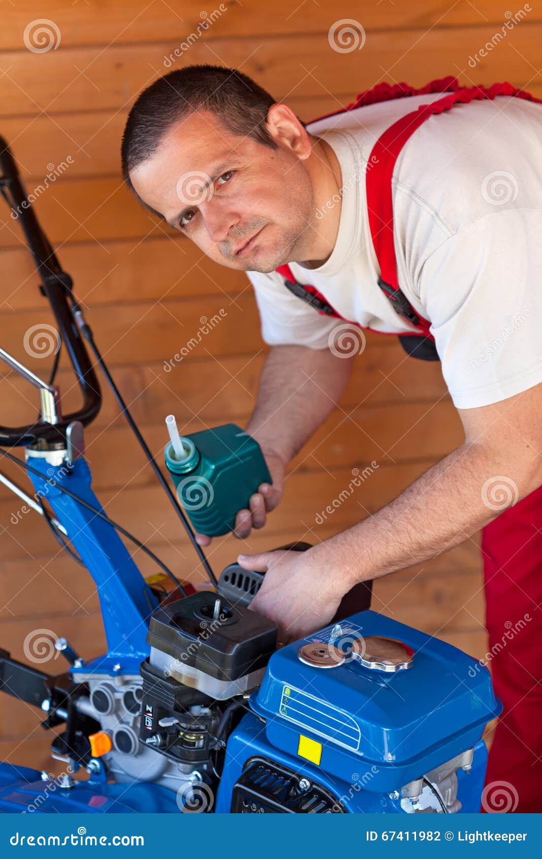 Maintenance of a Small Tiller Machine Stock Photo - Image of refill ...