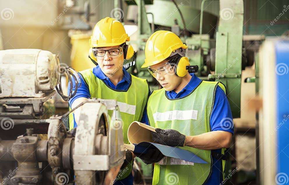 Maintenance Technicians and Engineers are Checking the Machines in the ...