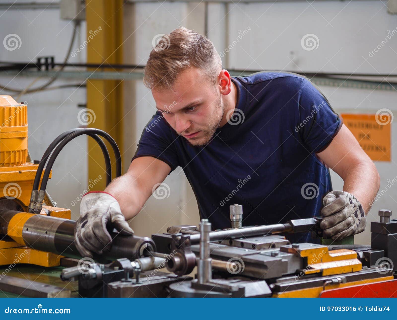 Maintenance Work on a Bending Machine in a Workshop. Stock Photo ...