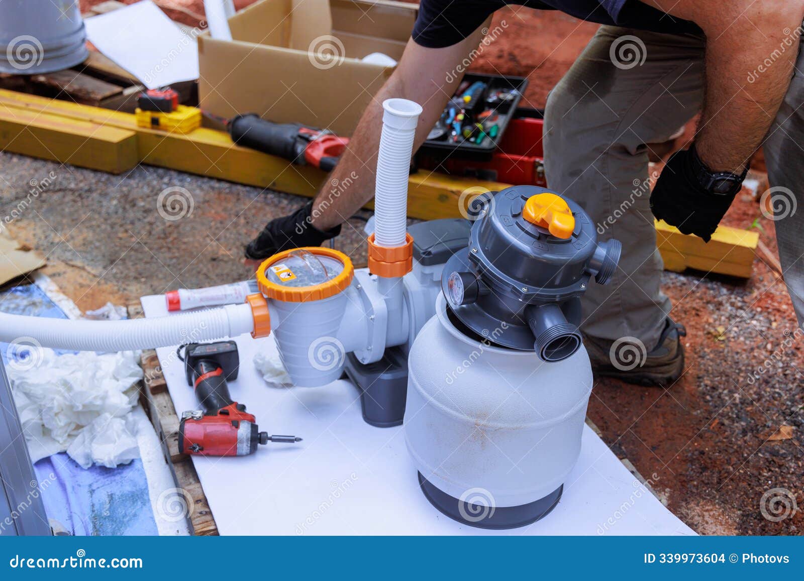 Maintenance Worker Installing Swimming Pool Cleaning Equipment a Sand ...