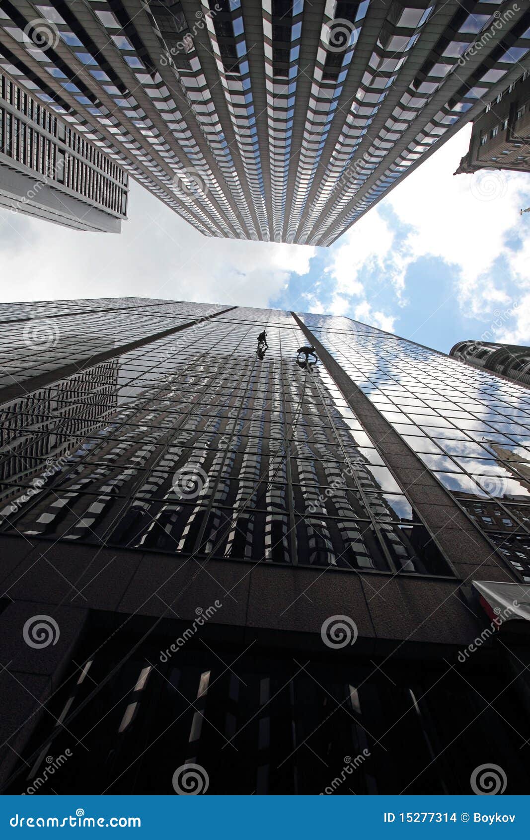 Maintenance Workers Climbing Outside a Skyscraper Stock Photo - Image ...