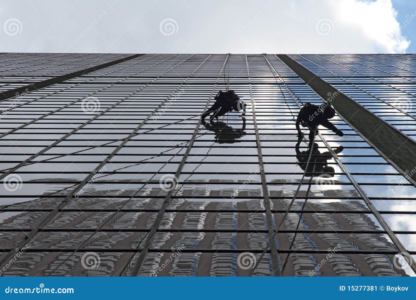 Maintenance Workers Climbing Outside a Skyscraper Stock Image - Image ...