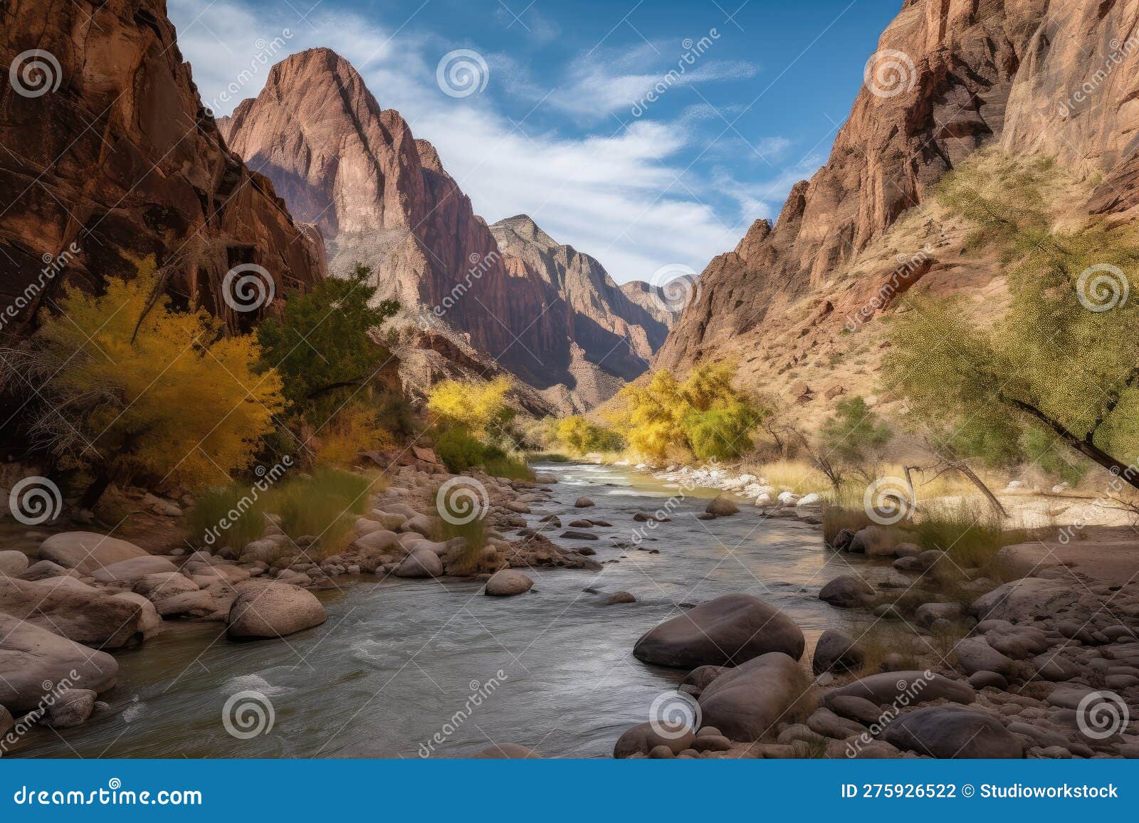 Majestic Canyon Surrounded by Towering Peaks, with a River Flowing ...