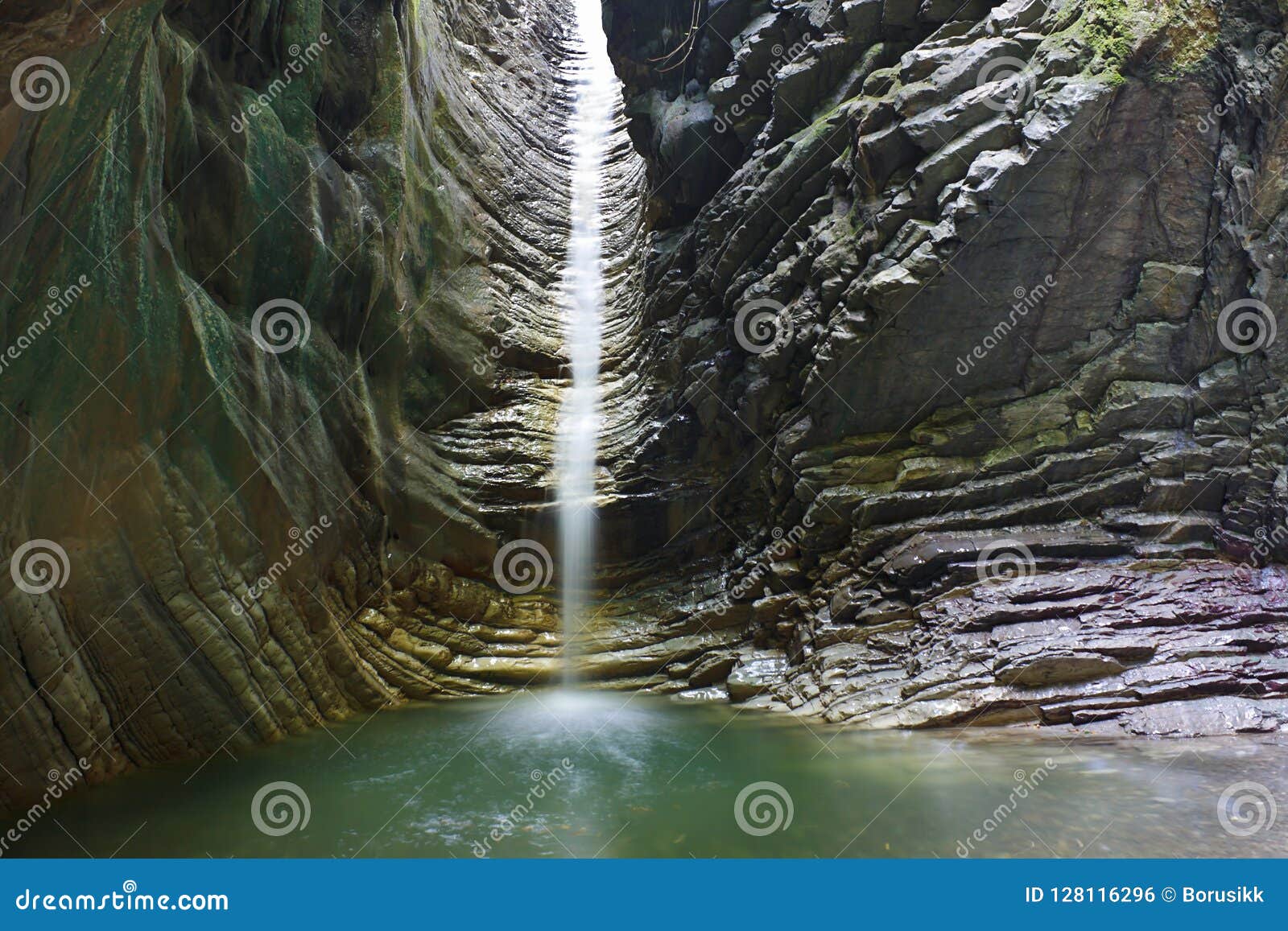 Majestic Grotto with Pouring Beautiful Waterfall Stock Photo - Image of ...