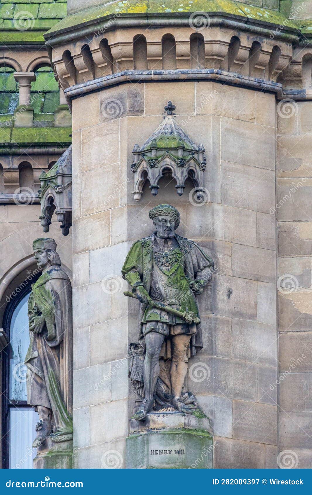 Majestic Tower Constructed of Bricks, with Statues Perched Atop the ...