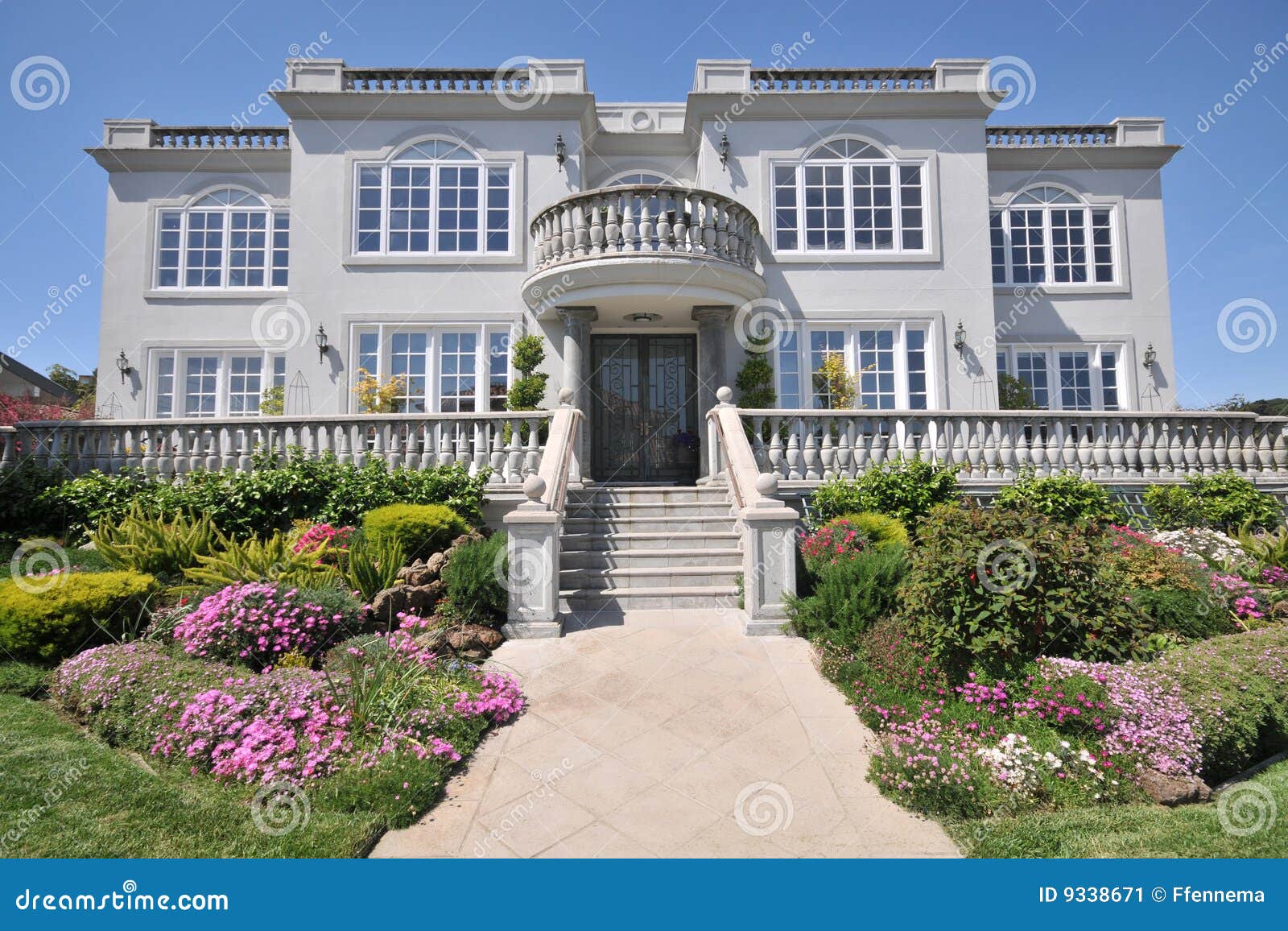Majestic Two Story Mansion with Shrubs in Yard Stock Image - Image of ...