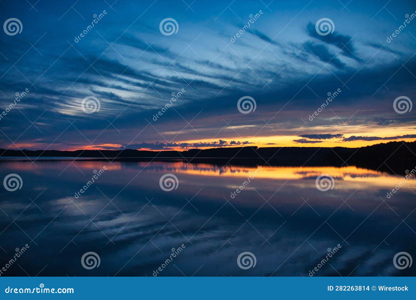 Majestic View of Lake Leon Reflecting the Sunset in the Backdrop Stock ...