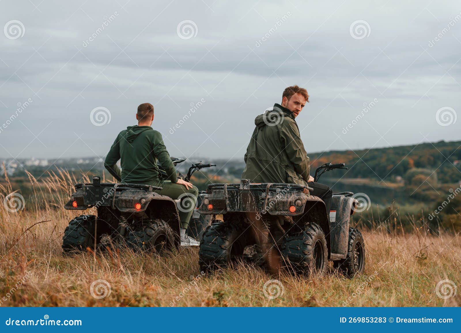 Majestic View. Two Men are on the Quad Bikes Outdoors on the Field Stock Image - Image of bike ...
