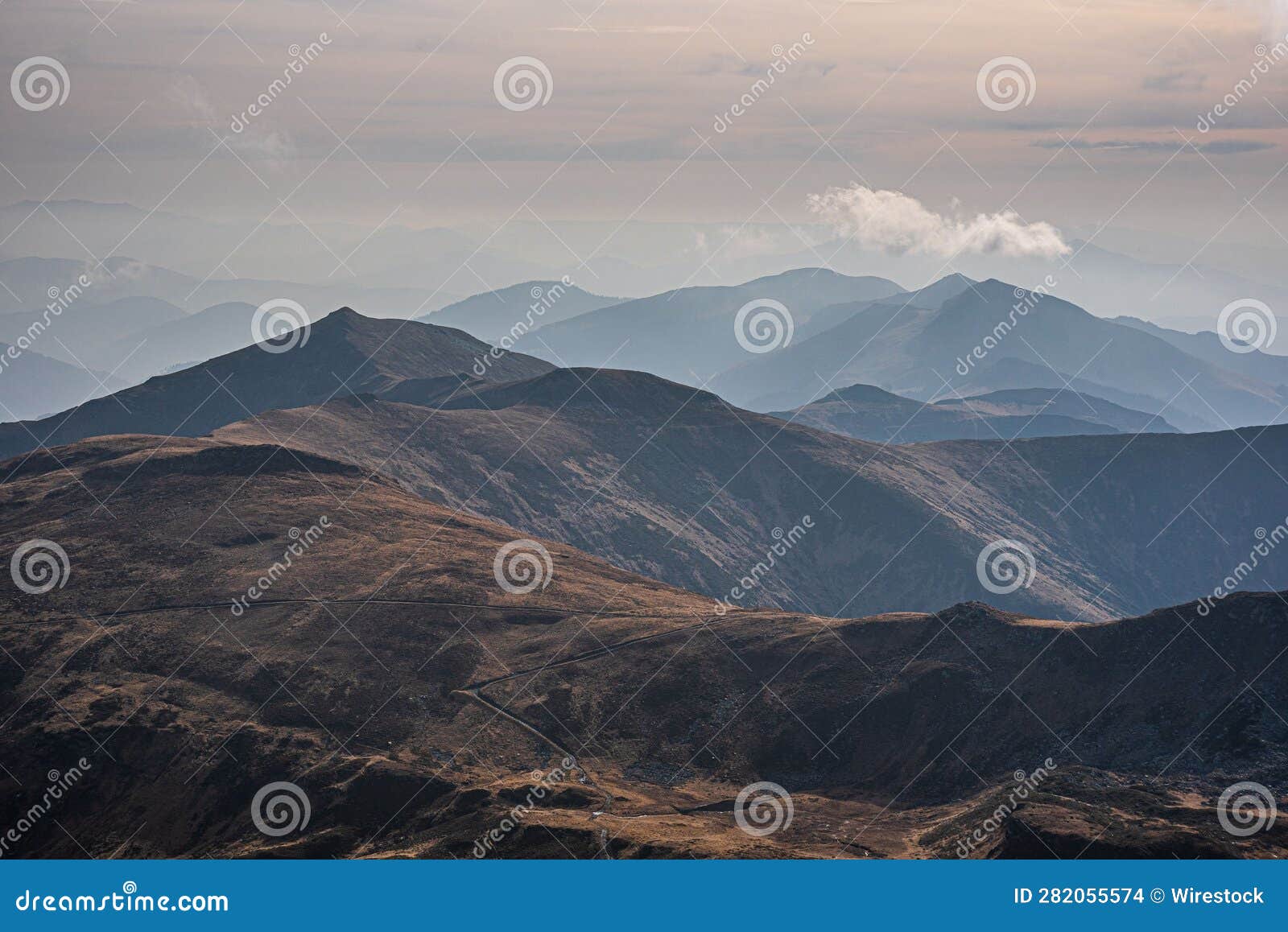 Majestic View of a Vast Mountain Range, with the Sun Shining Brightly ...