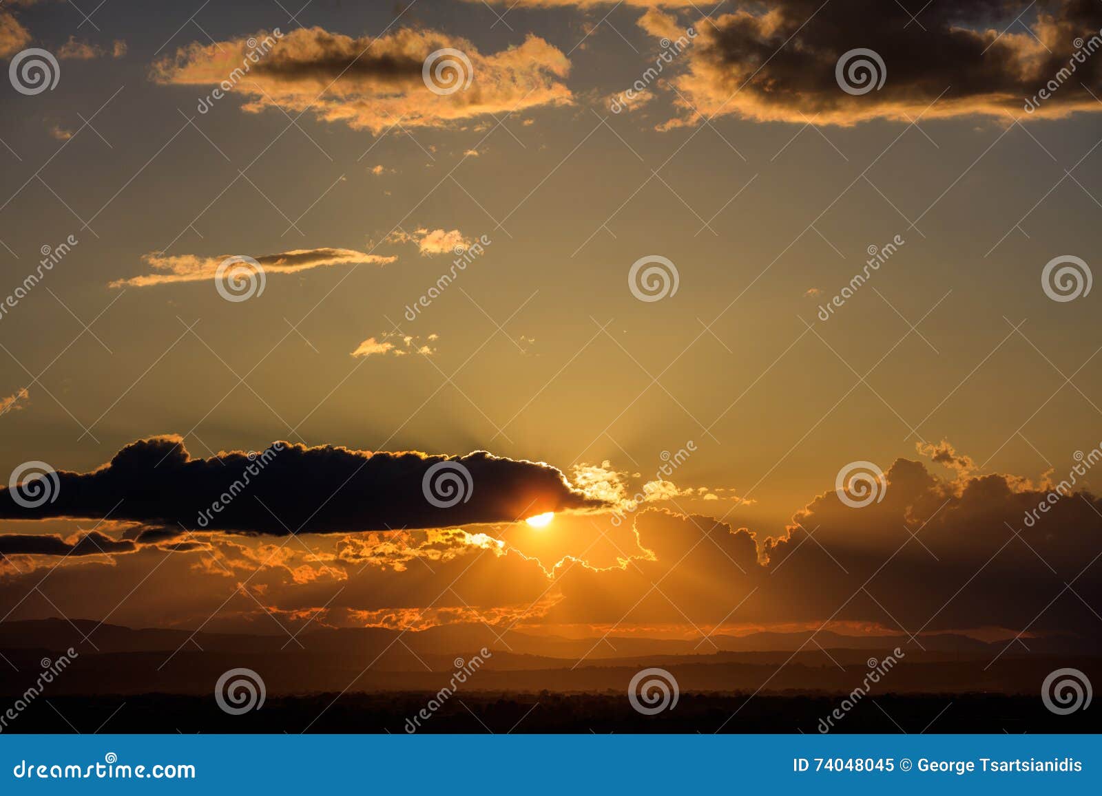 Majestic Vivid Sunset/sunrise with Dark Heavy Clouds Stock Image ...