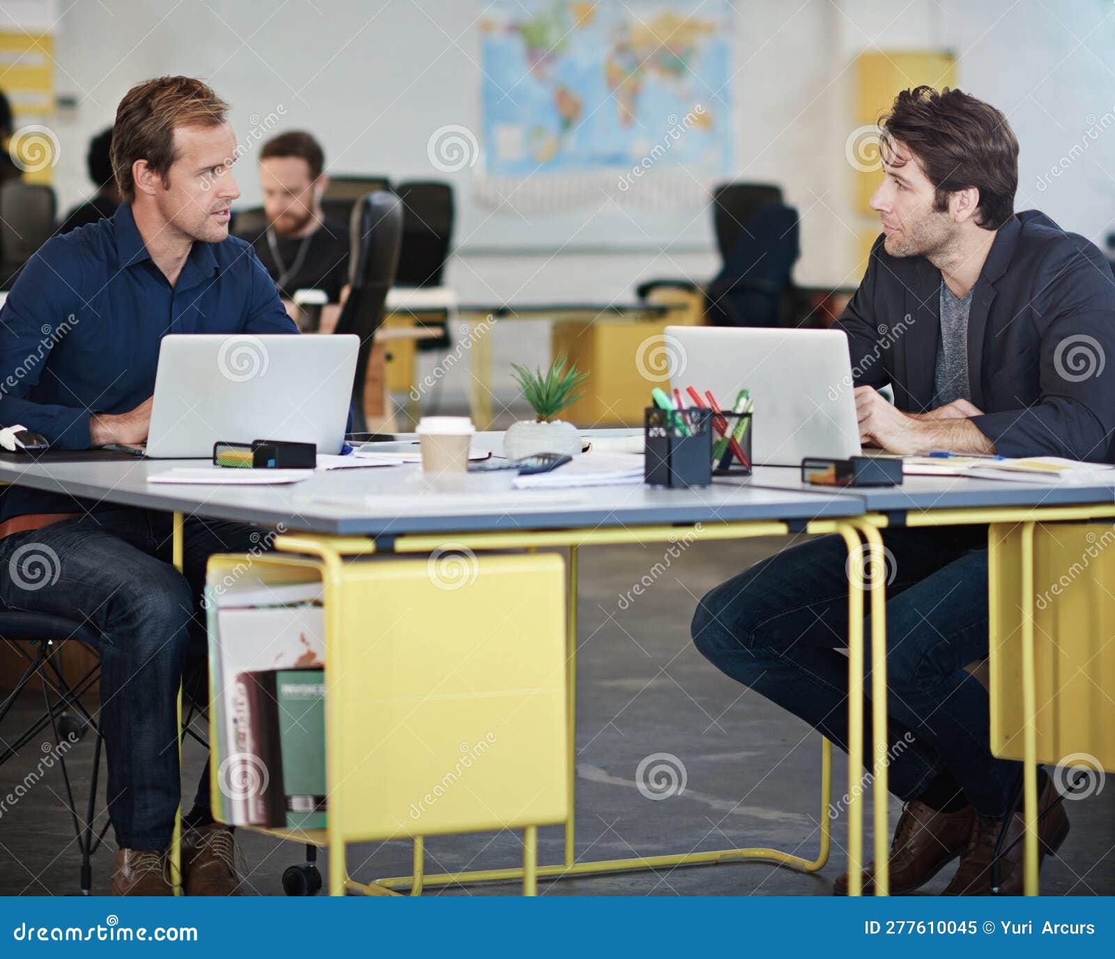 They Make Any Project Possible. Designers Talking Together while ...