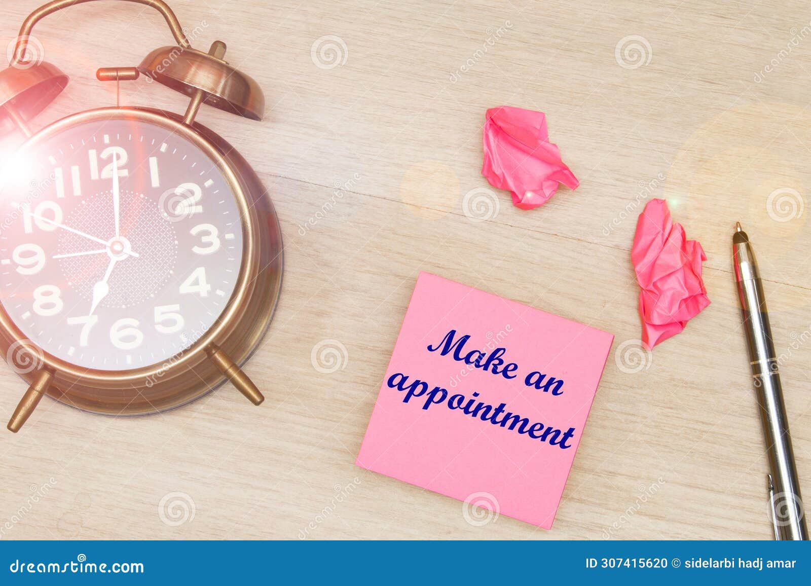 Make an Appointment on Pink Sticky Note on Office Table with Alarm ...