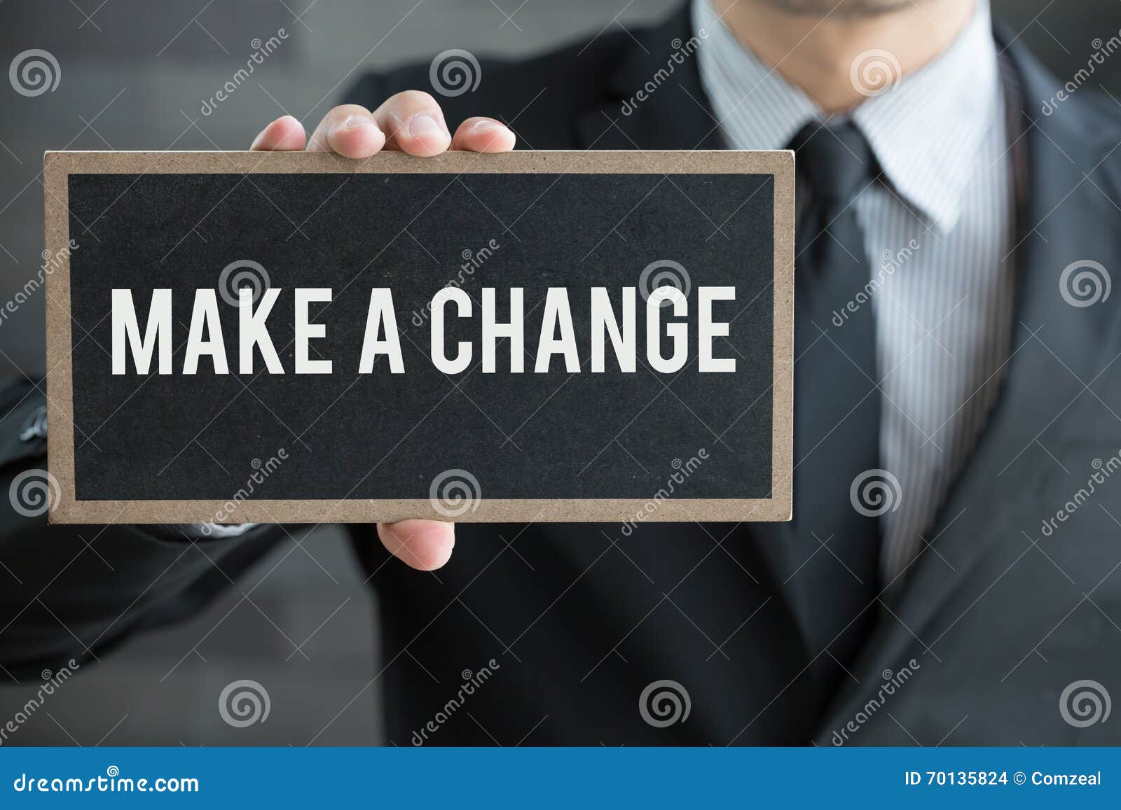 Make a Change, Message on Blackboard and Hold by Businessman Stock ...