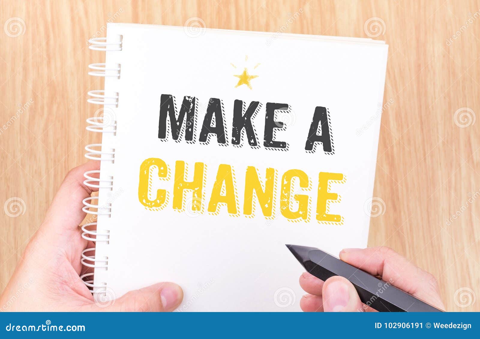 Make a Change Word on White Ring Binder Notebook with Hand Holding ...