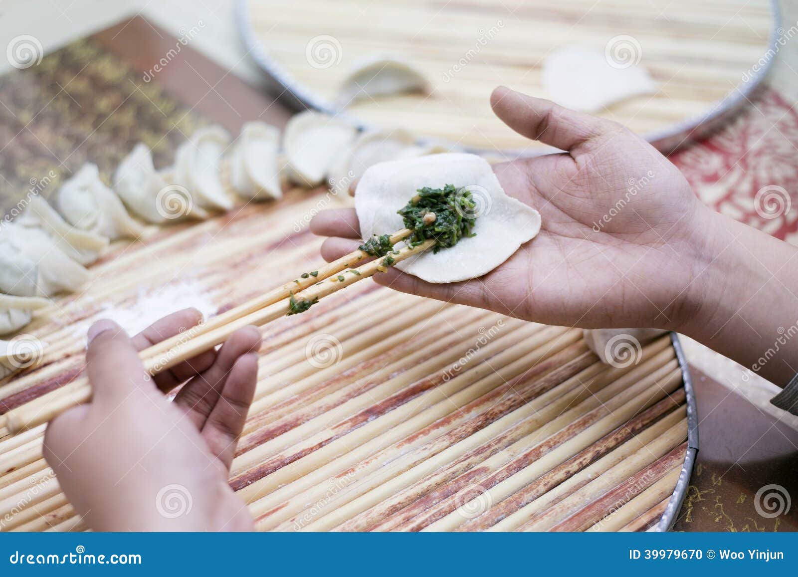 Make a dumpling stock photo. Image of person, people - 39979670