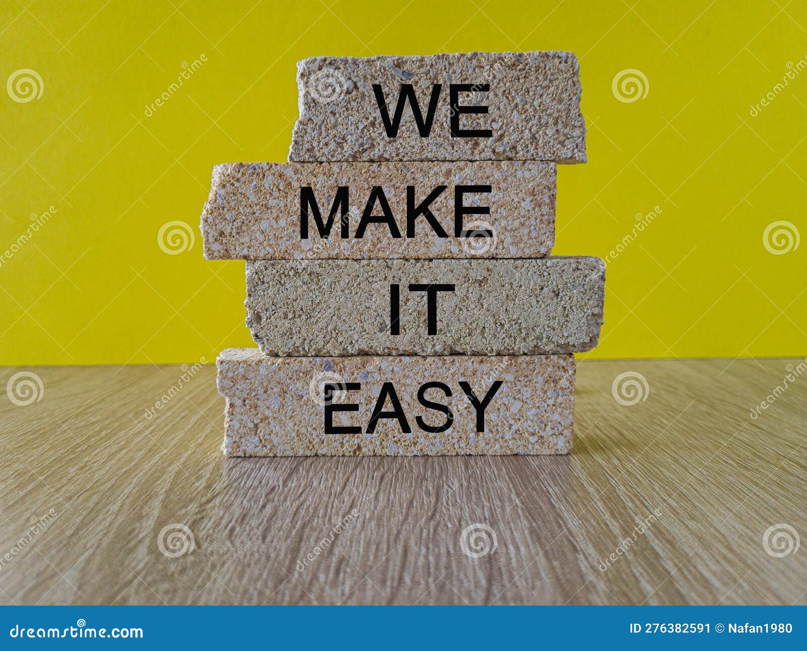 We Make it Easy Symbol. Concept Words we Make it Easy on Brick Blocks ...