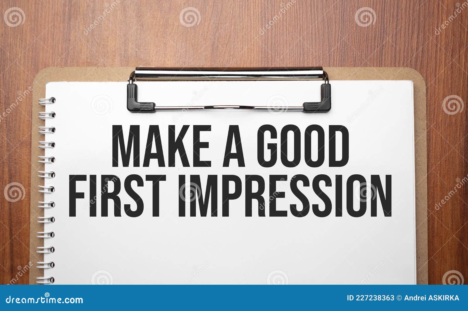 Make a Good First Impression Text on White Paper on the Wood Table ...