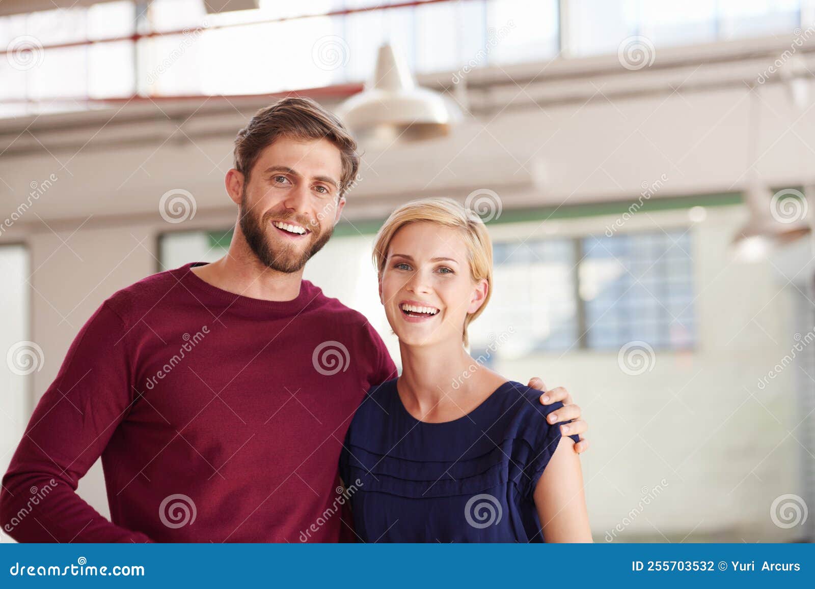 We Make a Great Team. a Couple Working Together in an Open Office ...