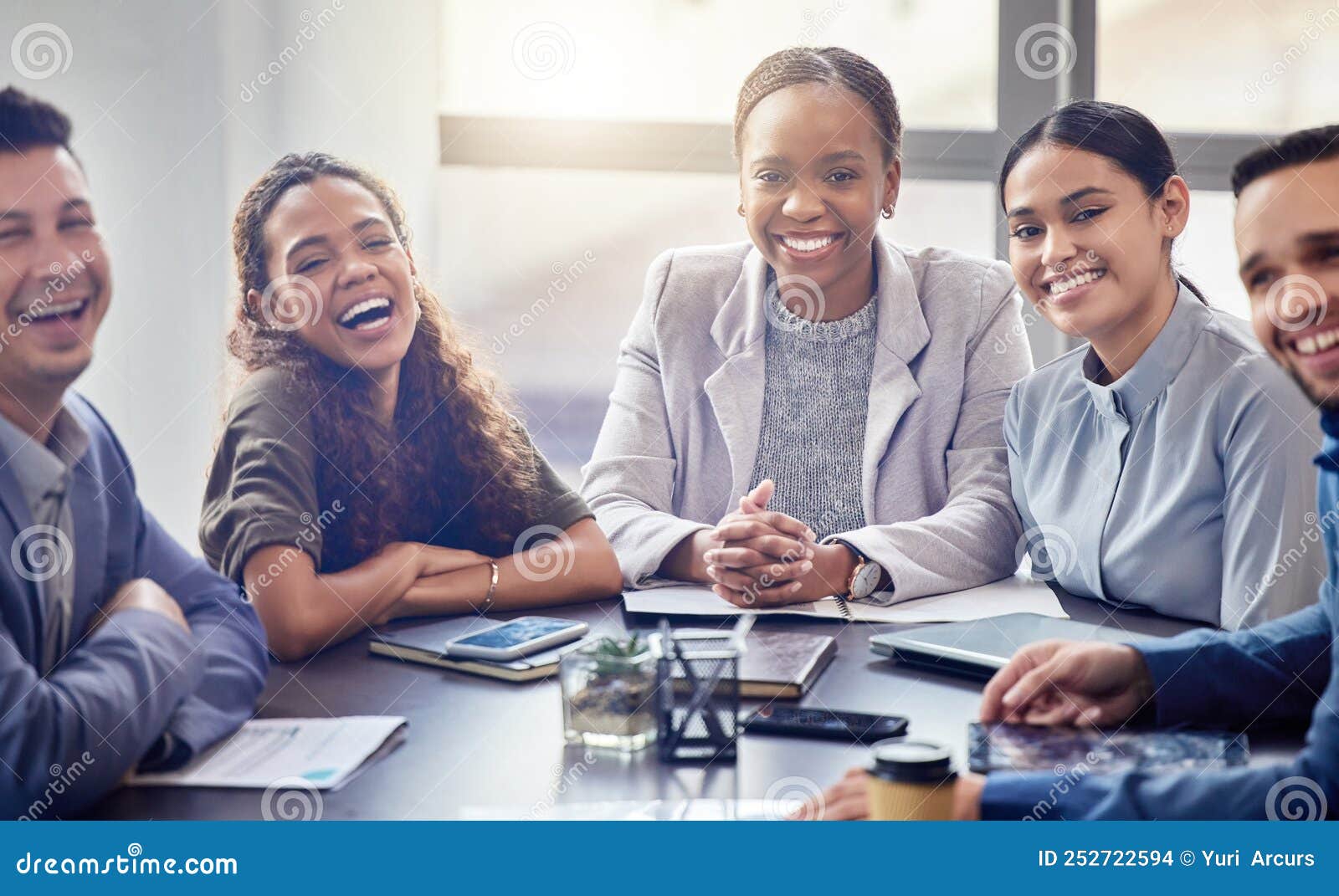 We Make a Great Team. a Group of Colleagues Having a Meeting in a ...