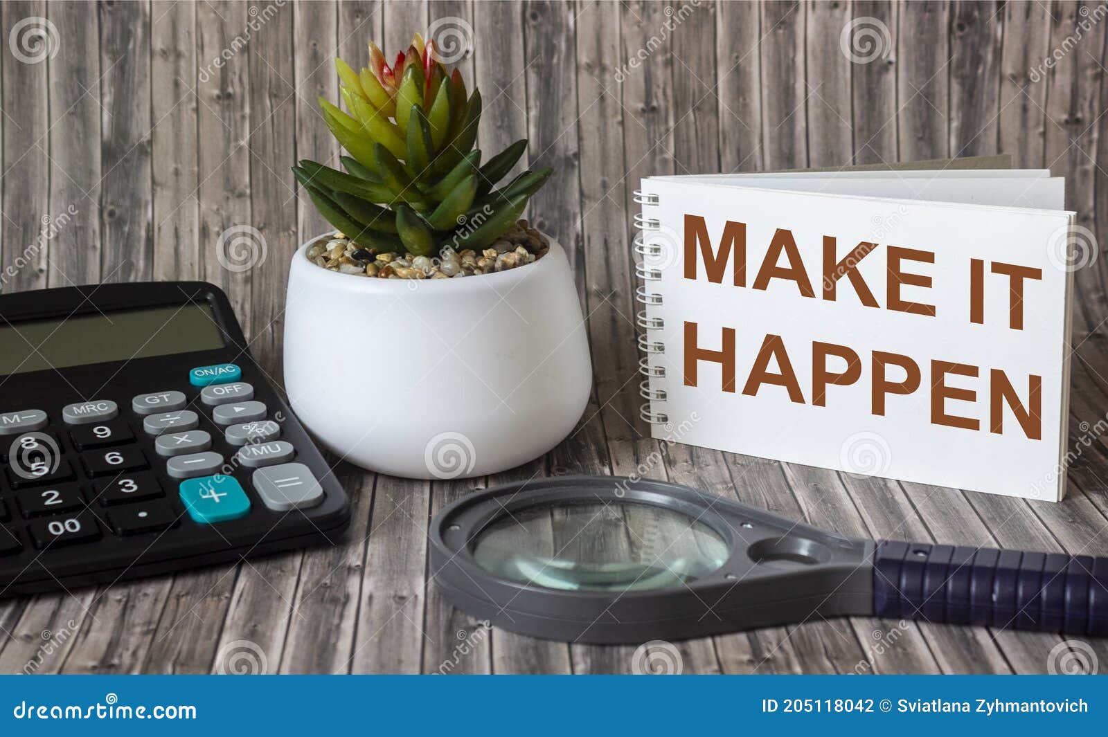 Make it Possible, the Phrase is Written on a Notebook and a Wooden ...