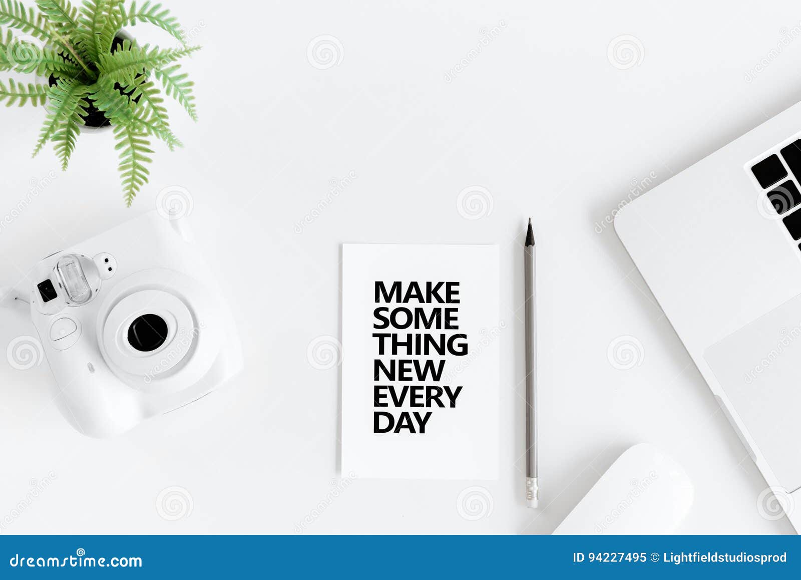Make Something New Everyday Motivational Quote and Instant Camera at ...