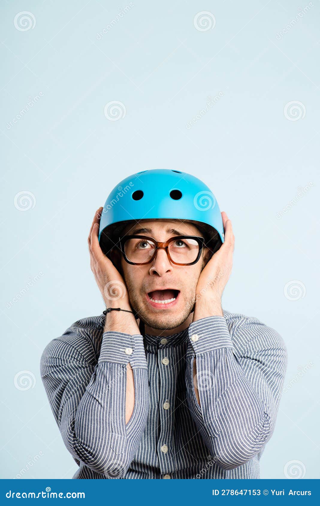 Make it Stop. a Handsome Young Man Sitting Alone in the Studio and ...
