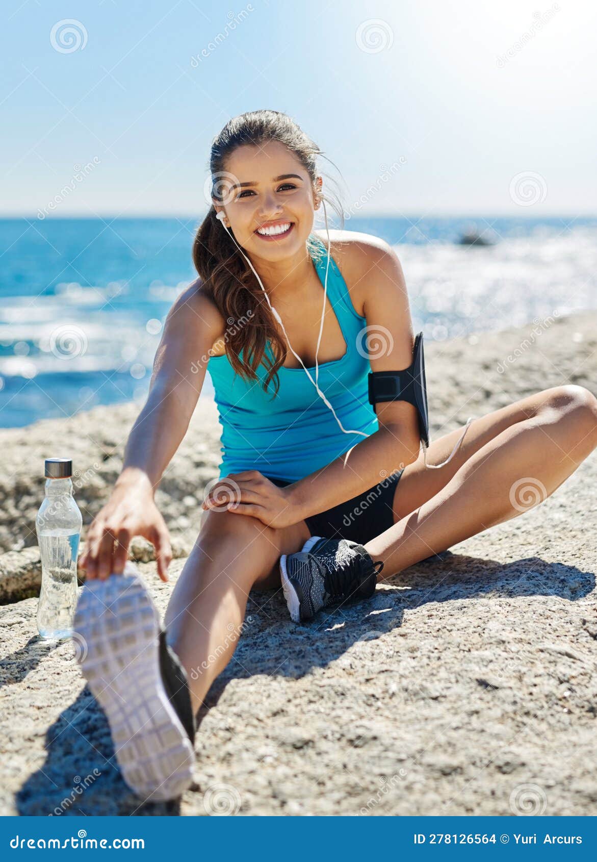 Make Stretching Fun Again. a Young Woman Stretching before Her Run ...