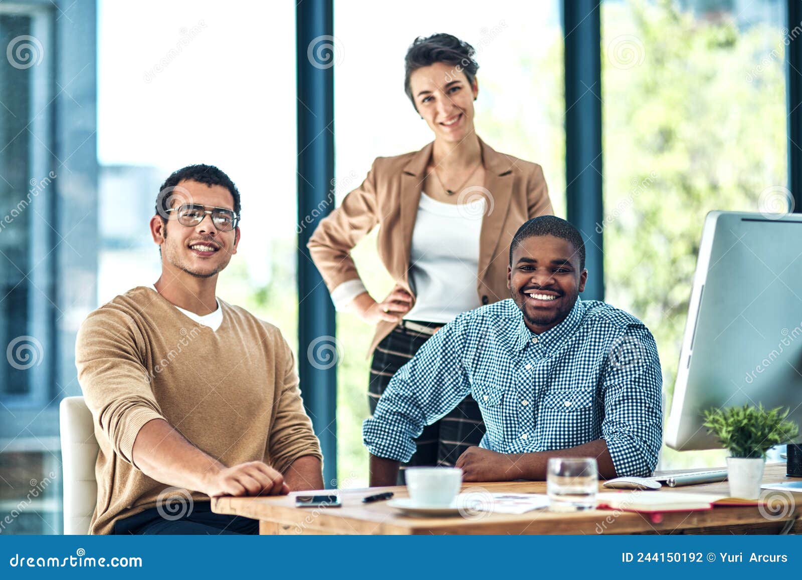 We Make Success Look Easy. Portrait of a Group of Designers Grouped ...