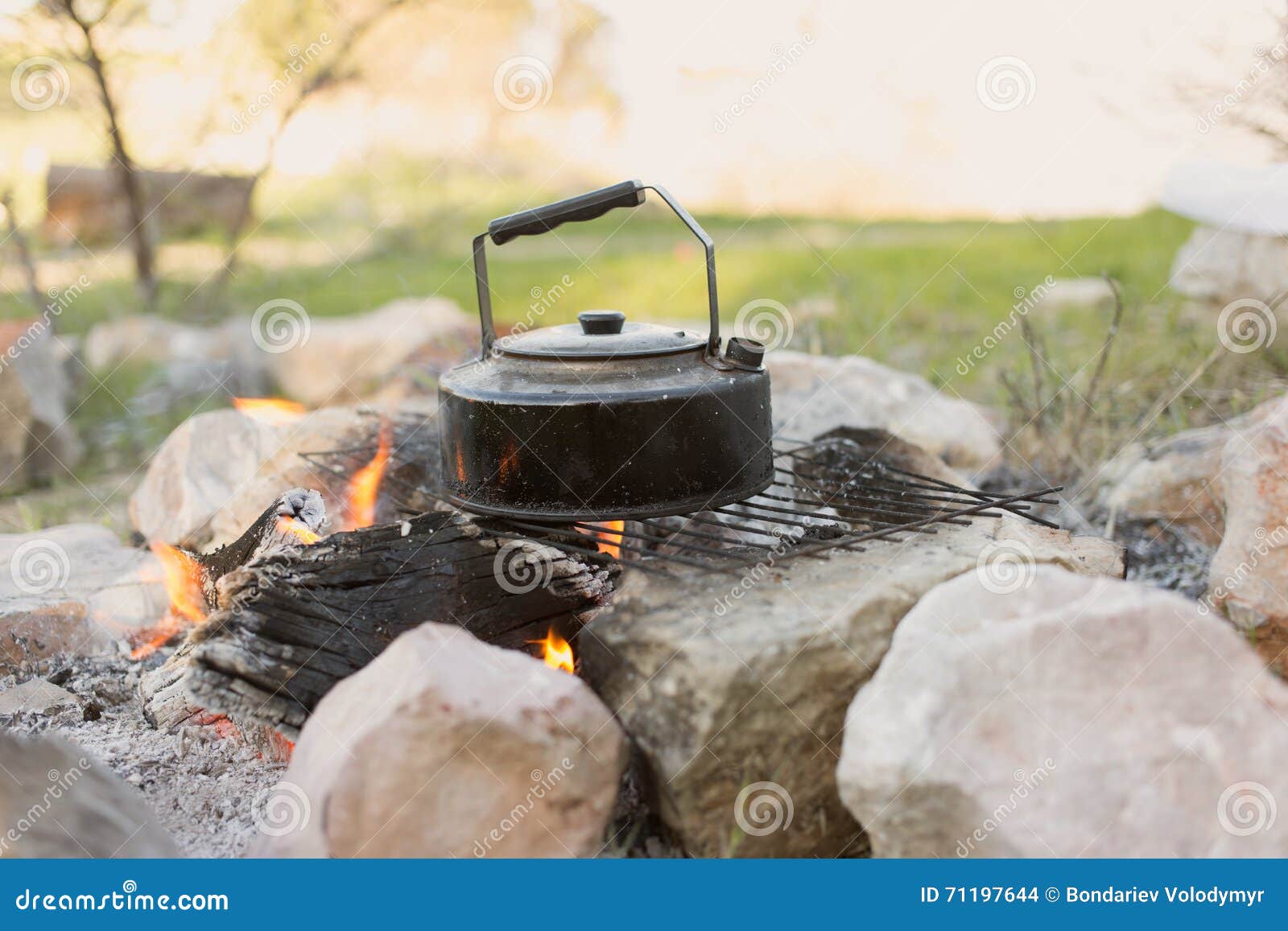 Make Tea Over an Open Fire in a Hike. Stock Photo - Image of boiling ...