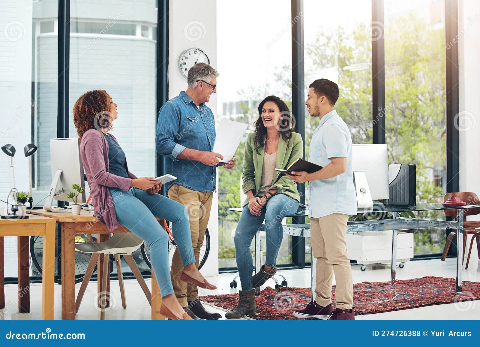 They Make Teamwork Look Easy. a Group of Creative Colleagues Exchanging ...